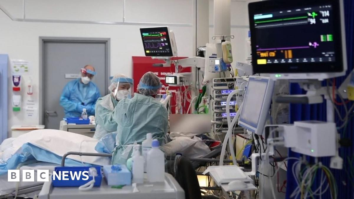 Covid-19: Northern Ireland health system 'one step from chaos' - BBC News