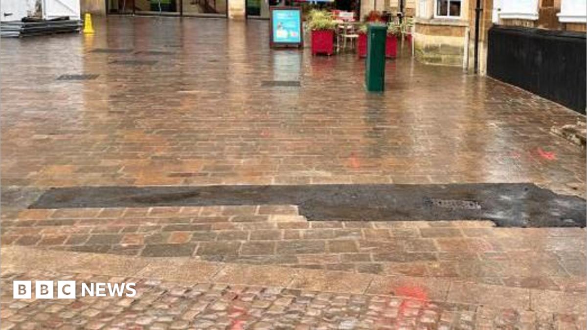 Council upset at 'scar' on Northampton's new market square - BBC News