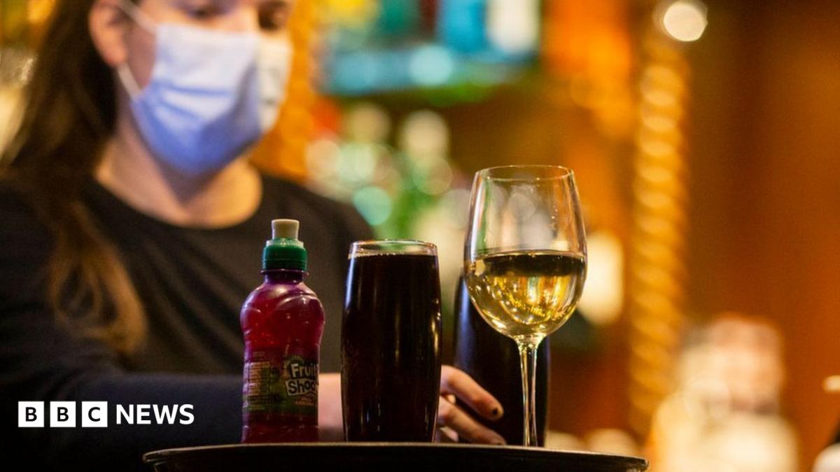 Covid: Welsh Government pulls Christmas drinks TV advert - BBC News