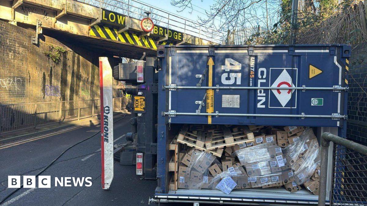 Birmingham trains suspended after lorry hits bridge in Erdington - BBC News