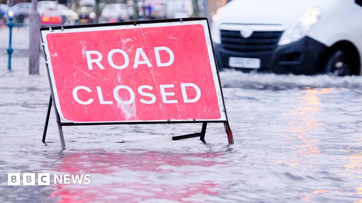 Forecasters warn of floods as amber rain warning issued - BBC News