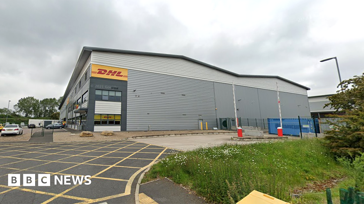 Romanian arrested on espionage offences over Minworth DHL fire - BBC News