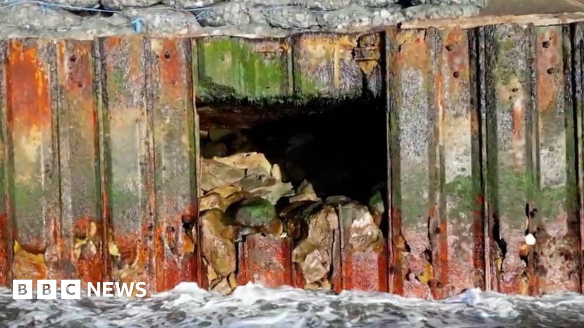 Isle of Wight drone footage shows large holes in seawall - BBC News