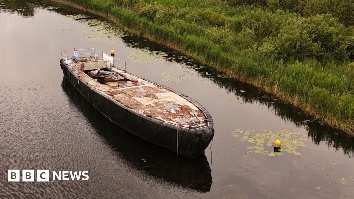 WW2 whaleback boat saved from river ahead of restoration - BBC News