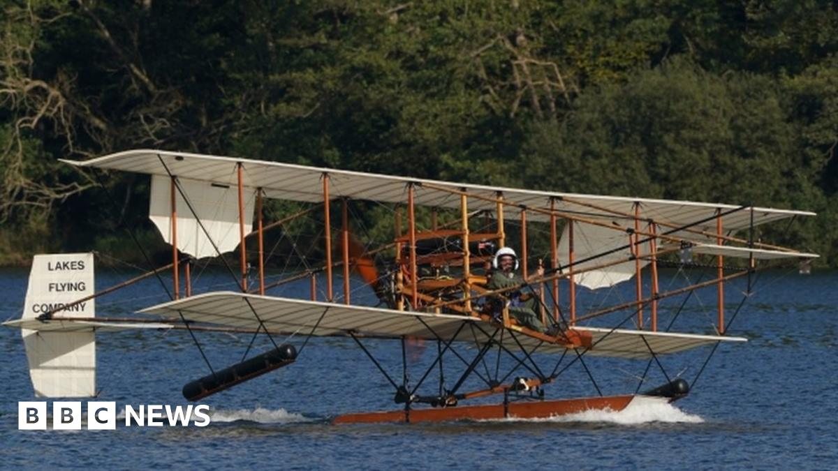 Waterbird: Replica of UK's first seaplane flies over Windermere - BBC News
