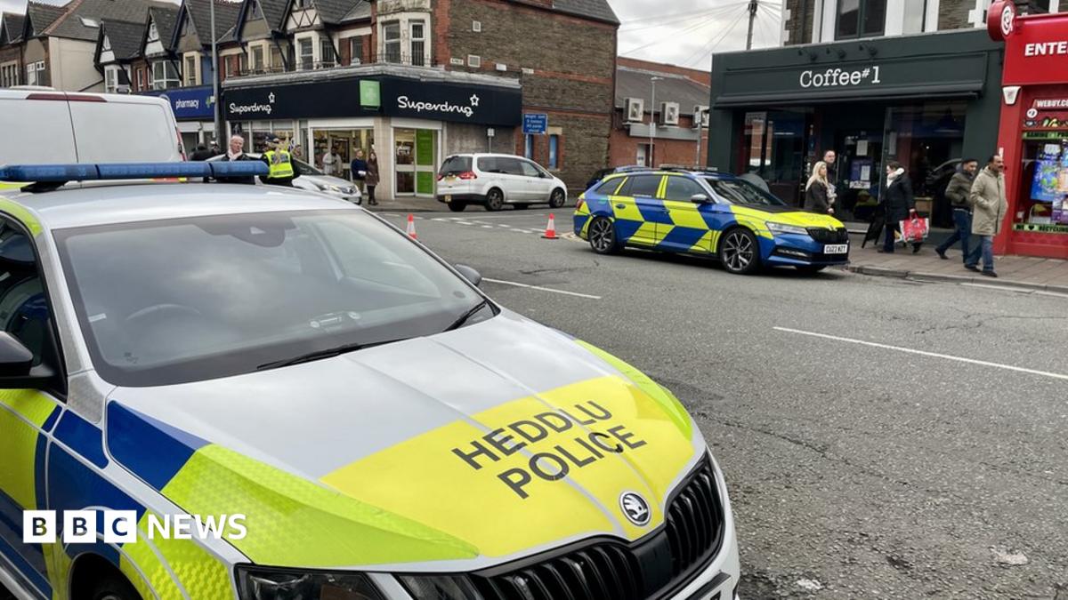 Cardiff crash: Dangerous driving arrests after woman injured - BBC News