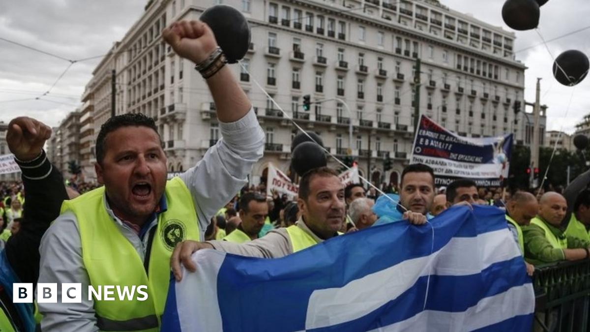 Greeks walk out in general strike over cuts - BBC News