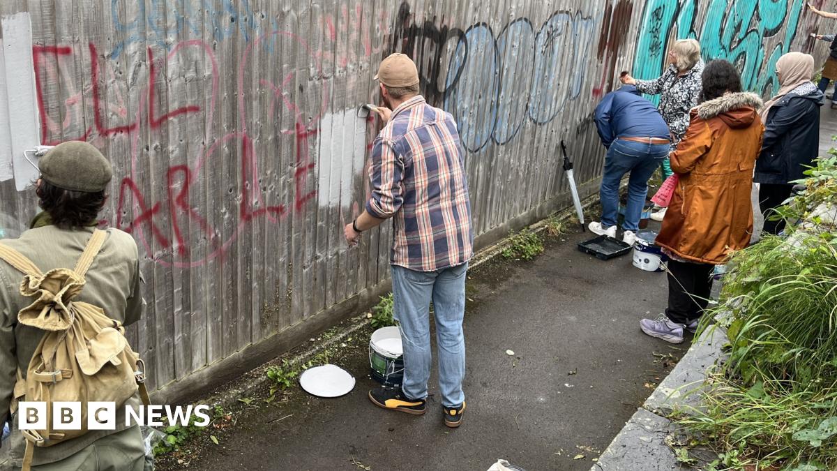 Far-right graffiti in Swindon removed by 'horrified' residents - BBC News