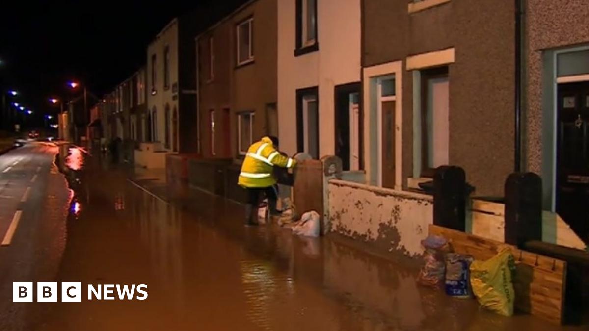 Cumbria hit by flooding after heavy rain - BBC News