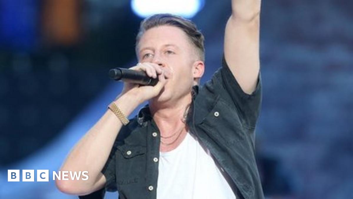 Do white rappers benefit from 'white privilege'? - BBC News