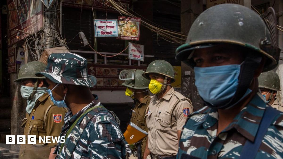 Coronavirus: India enters 'total lockdown' after spike in cases - BBC News