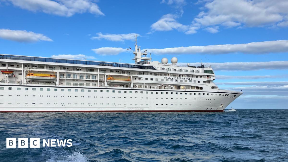 Stranded cruise ship Odyssey sails out of Belfast Lough - BBC News
