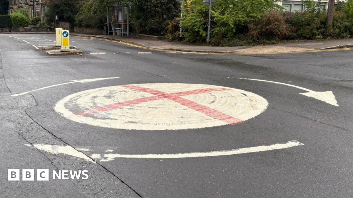 Leeds roundabout flags could cause crashes, says council - BBC News