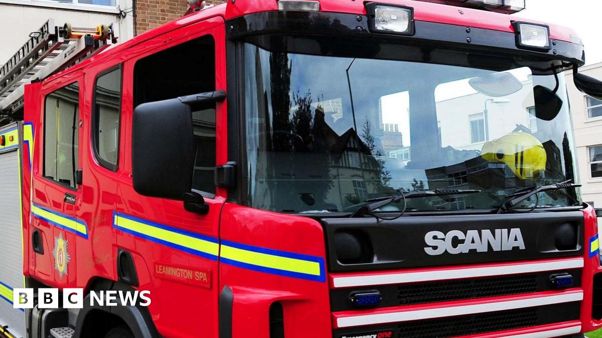 Fire crews free man trapped under lorry in Rugby - BBC News