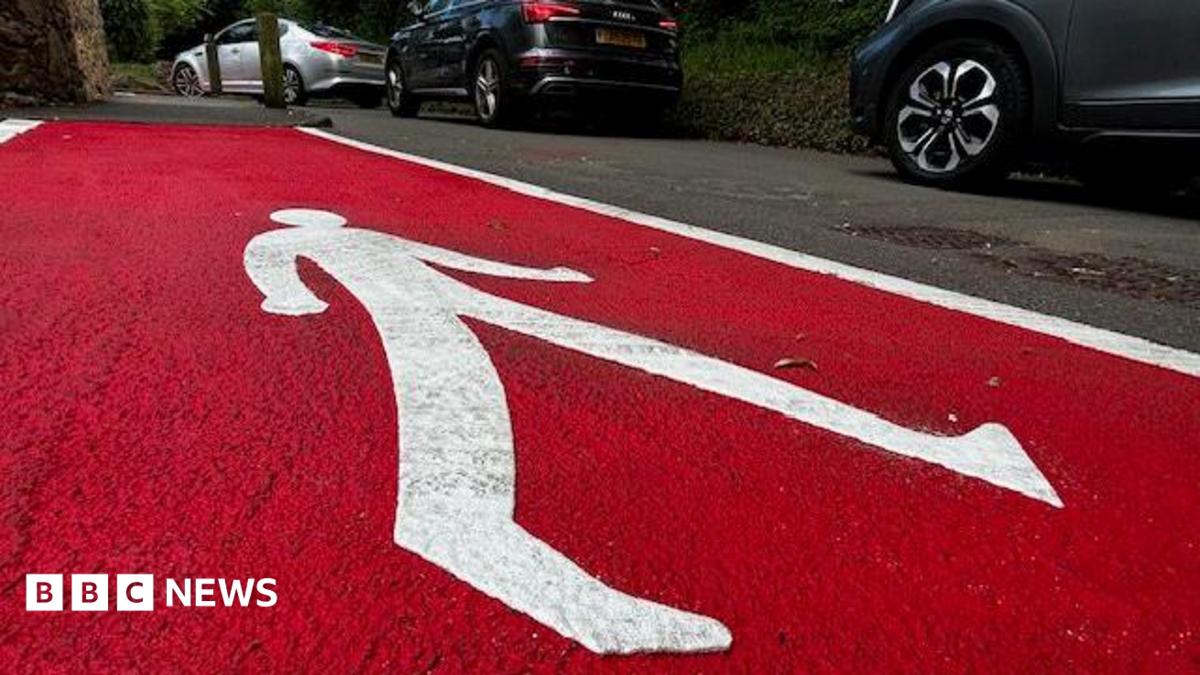 Red stripe on rural lane sparks social media storm - BBC News