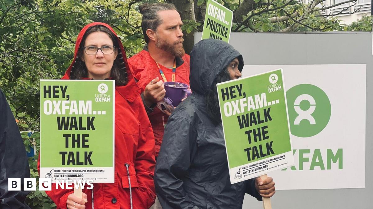 Oxfam workers protest over 'outsourcing' of jobs - BBC News