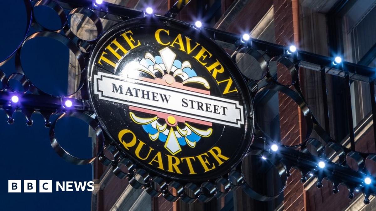 Liverpool's Cavern Quarter 30-year-old archway signs restored - BBC News