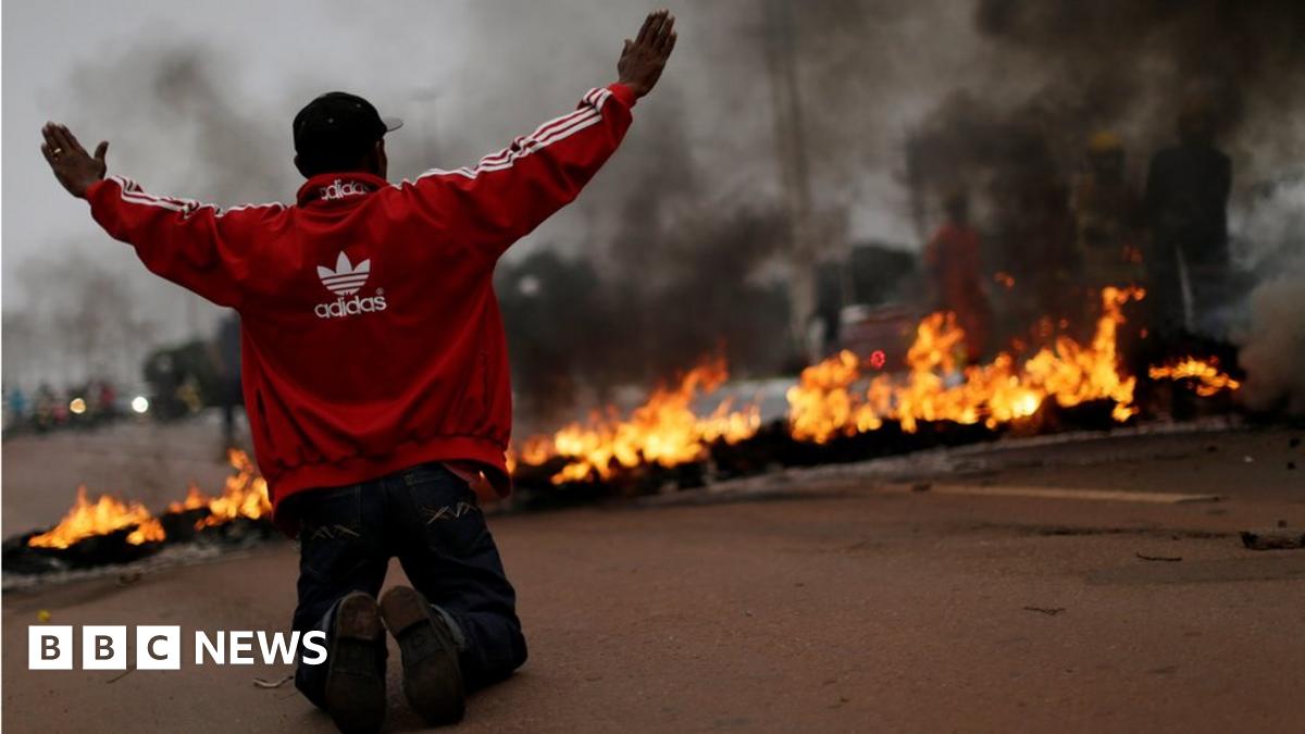 Brazil hit by first general strike in two decades - BBC News