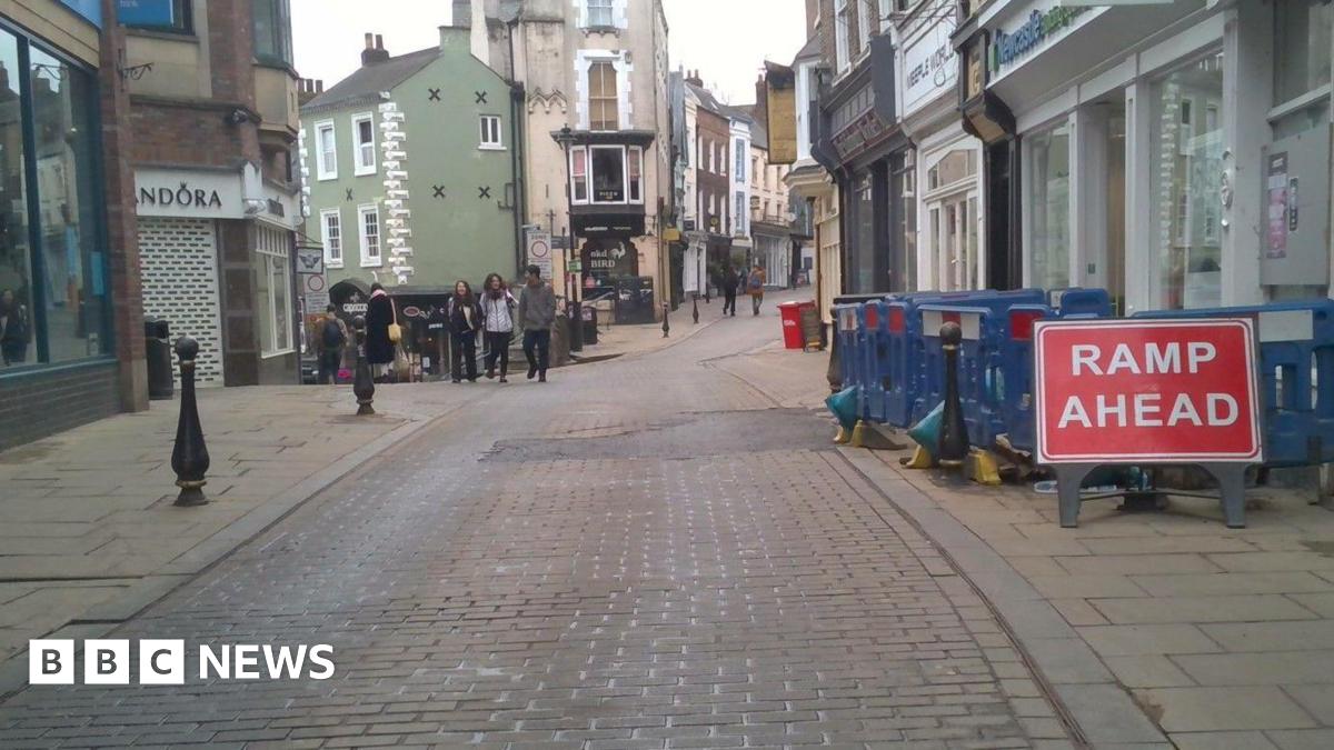 Durham city centre road reopens after flooding - BBC News