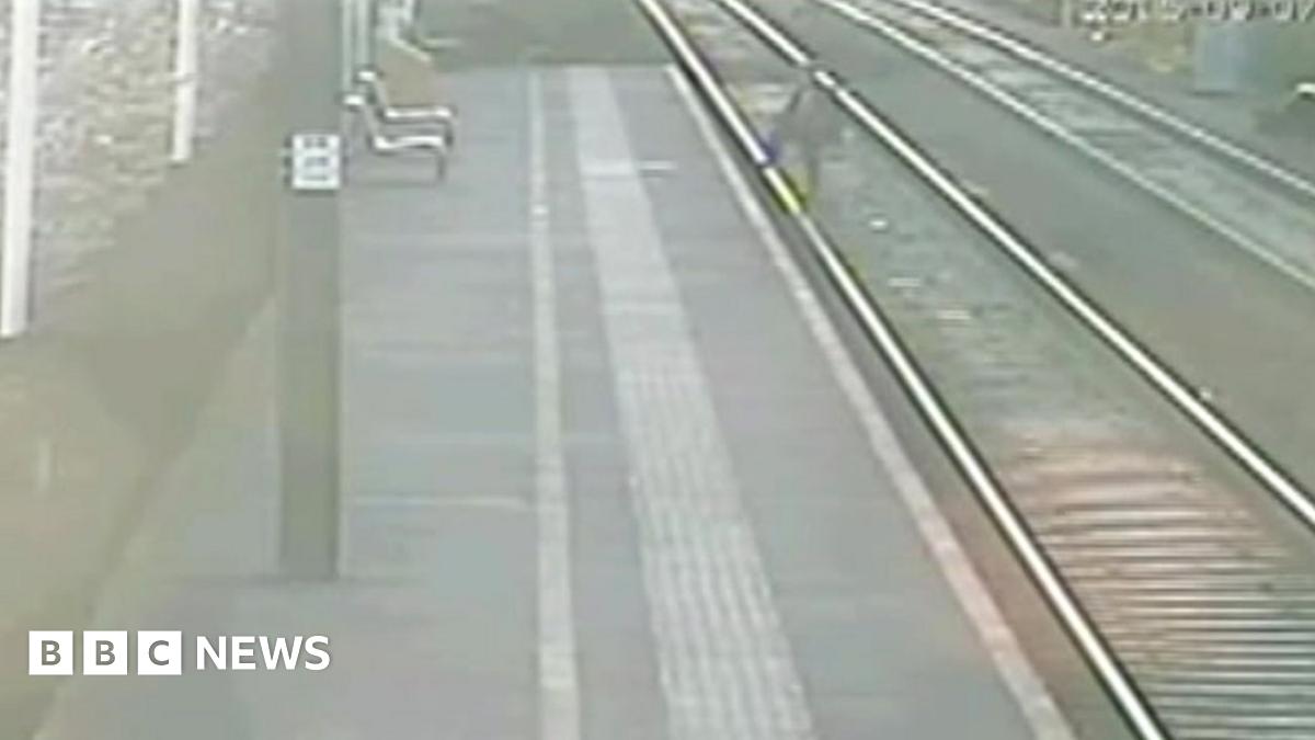 Railway line trespasser 'dicing with death' - BBC News
