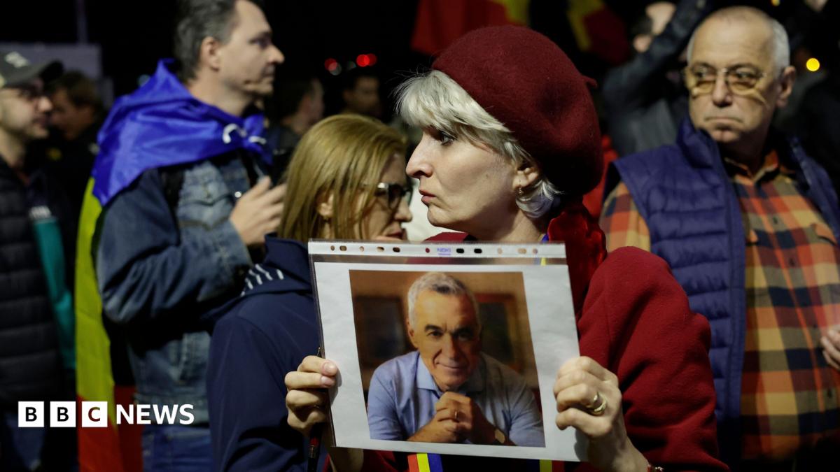 Georgescu barred from Romanian vote in final court ruling - BBC News