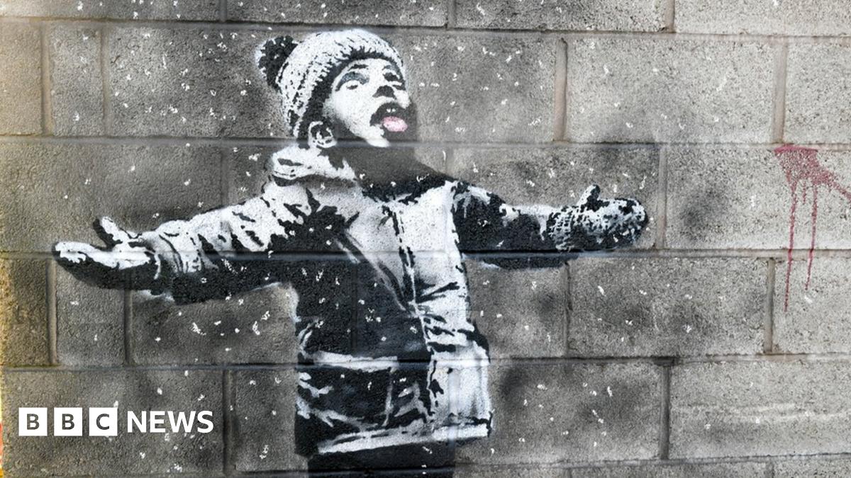 Banksy's 'Season's Greetings' protected with plastic - BBC News