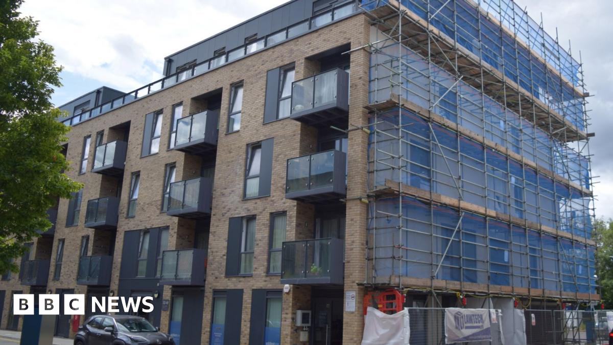 Cladding replaced on Addlestone One apartments - BBC News