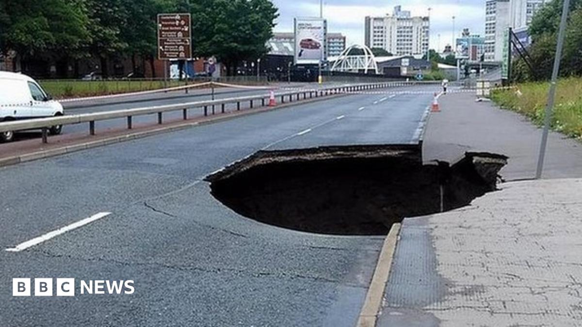 Sinkhole road remains closed for at least 10 days - BBC News
