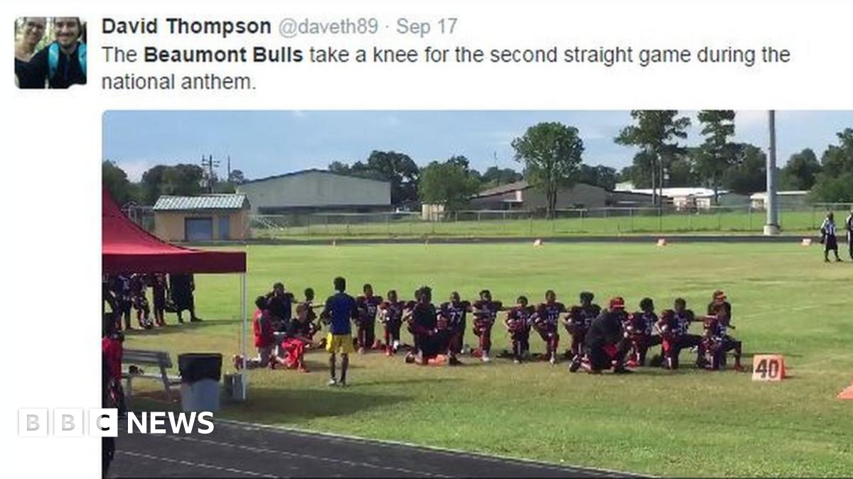 Student athletes join US national anthem protest - BBC News