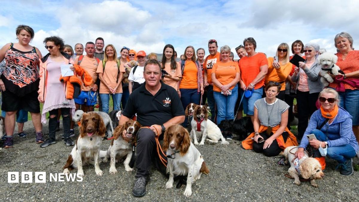 Hundreds join Max the miracle dog's Keswick birthday walk - BBC News