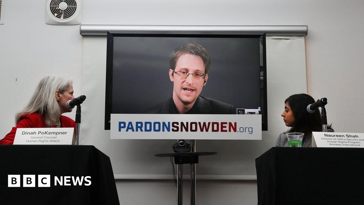 Edward Snowden hits out at critical report into his activities - BBC News