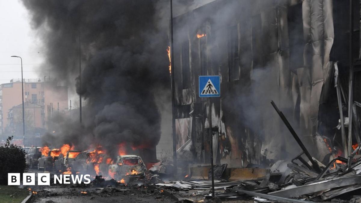 Milan plane crash: Eight dead as private plane hits building - BBC News