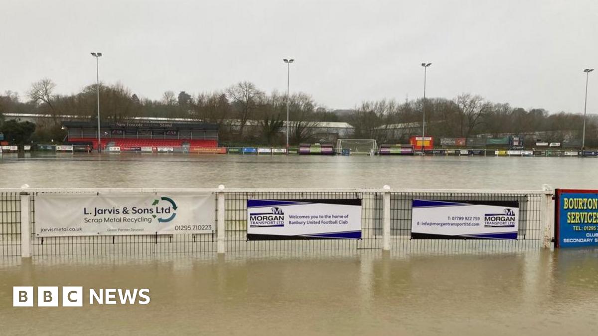 Banbury United's pitch left submerged by flood-water - BBC News