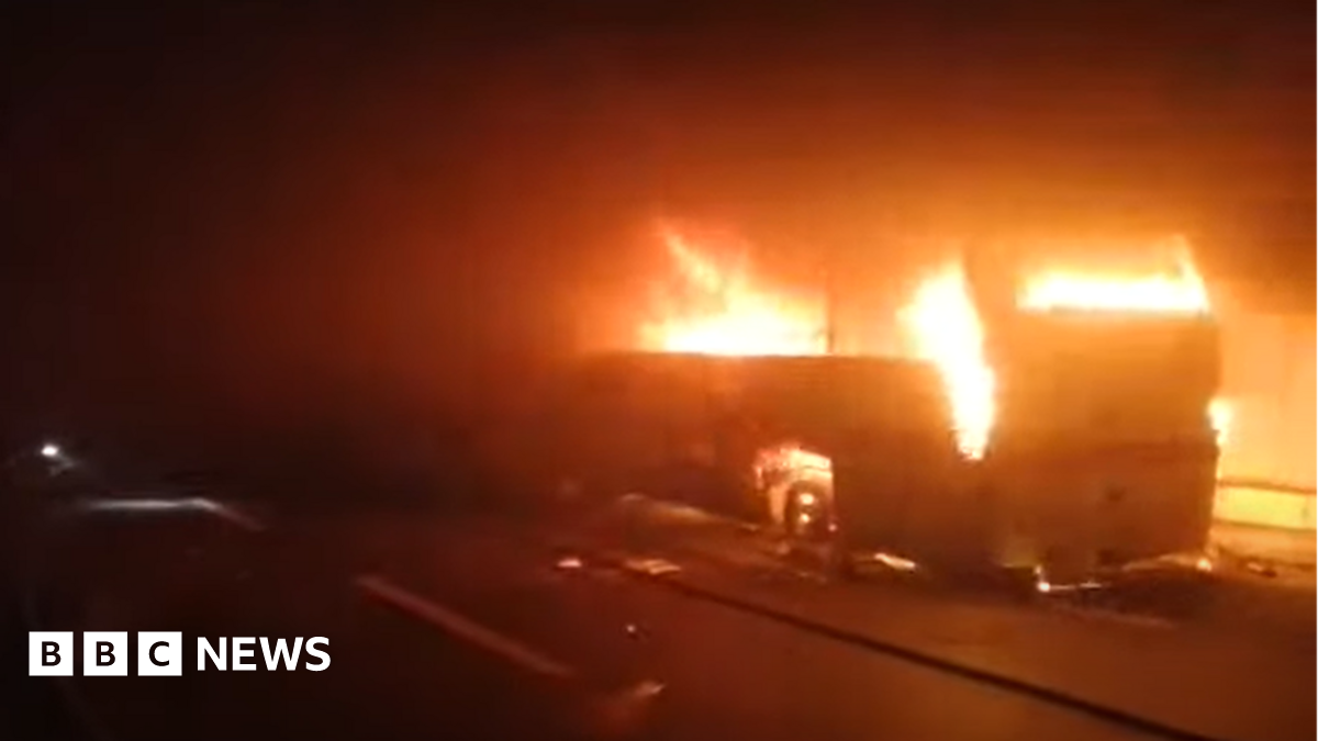 Italy bus driver saves 25 children from vehicle blaze - BBC News