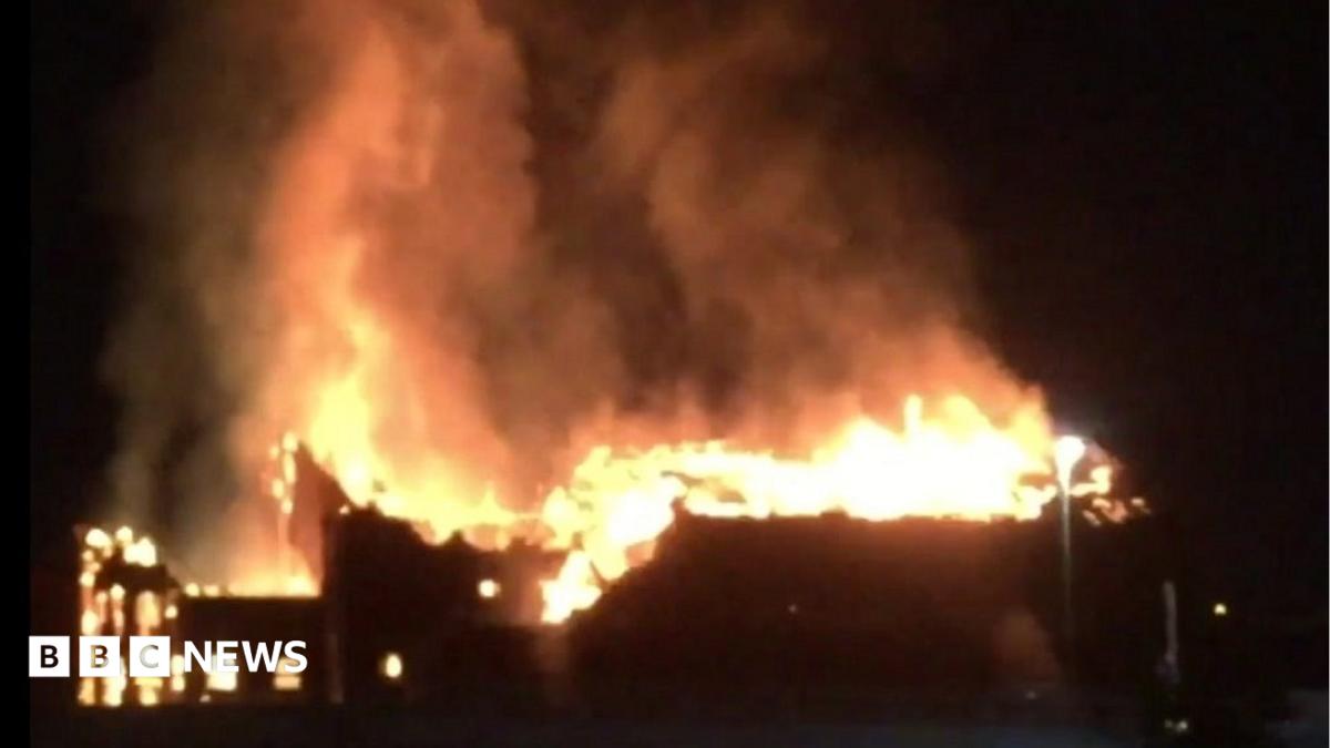 Baker's Quay fire Gloucester: Two men charged - BBC News