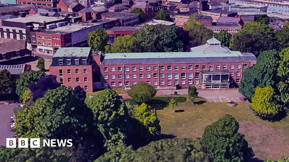 Wrexham councillors avoid jail by voting for local plan - BBC News