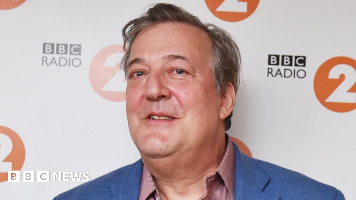 Stephen Fry back at work three months after fall off stage - BBC News