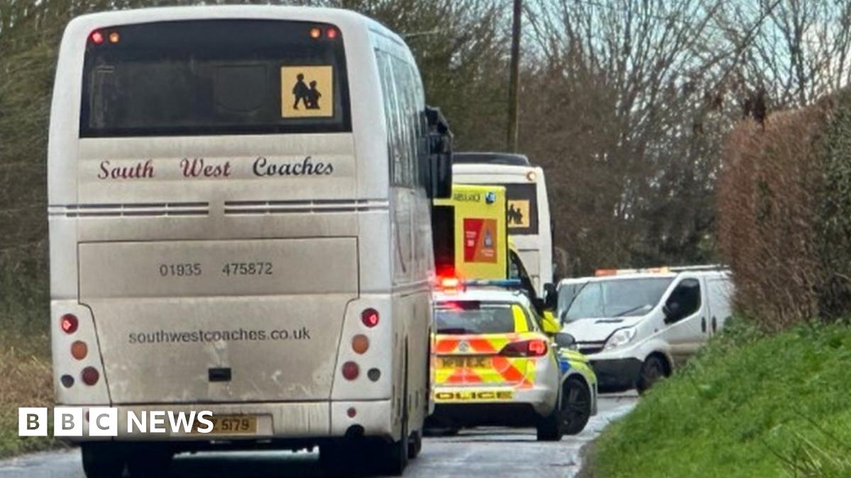 Van driver hurt in Sherborne school coach crash - BBC News