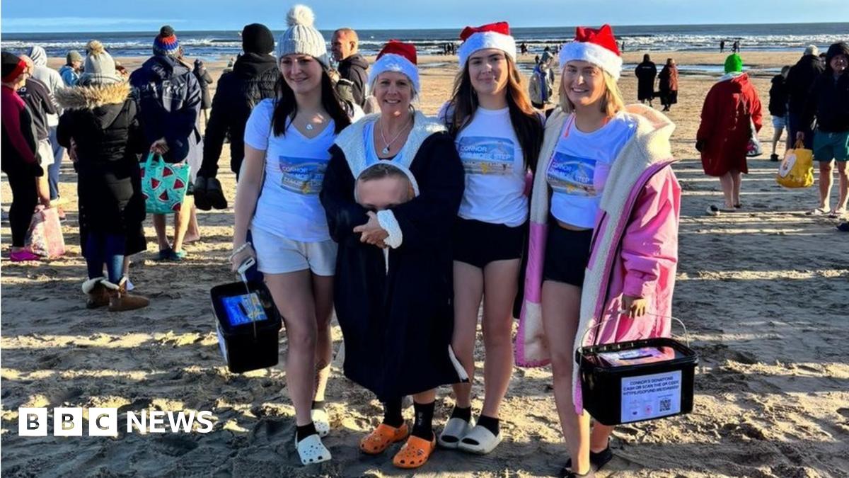 Connor Todd: Hundreds brave chilly waters in memory of teen - BBC News