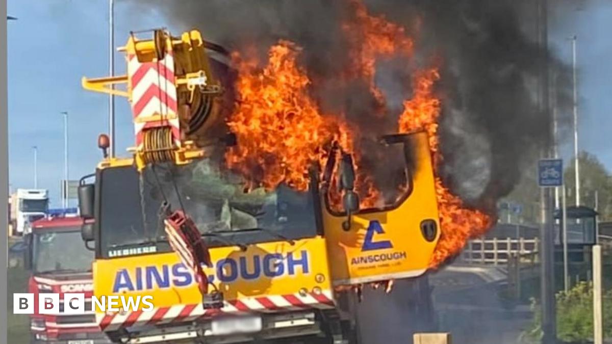 Crane lorry fire closes Whittlesey road after fuel spillage - BBC News