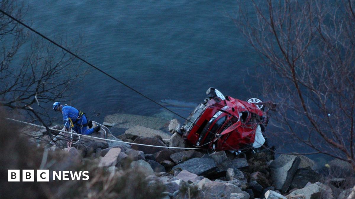 Police name man and woman killed in loch car crash - BBC News