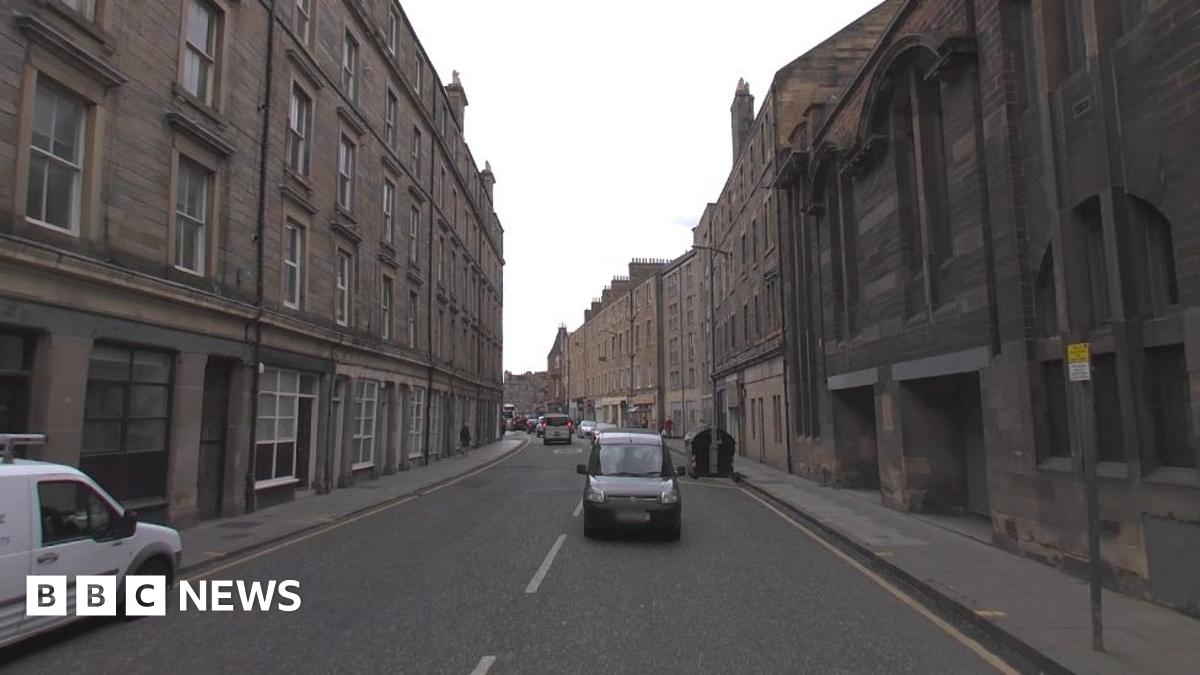Man falls out of window and lands on woman in Edinburgh street - BBC News