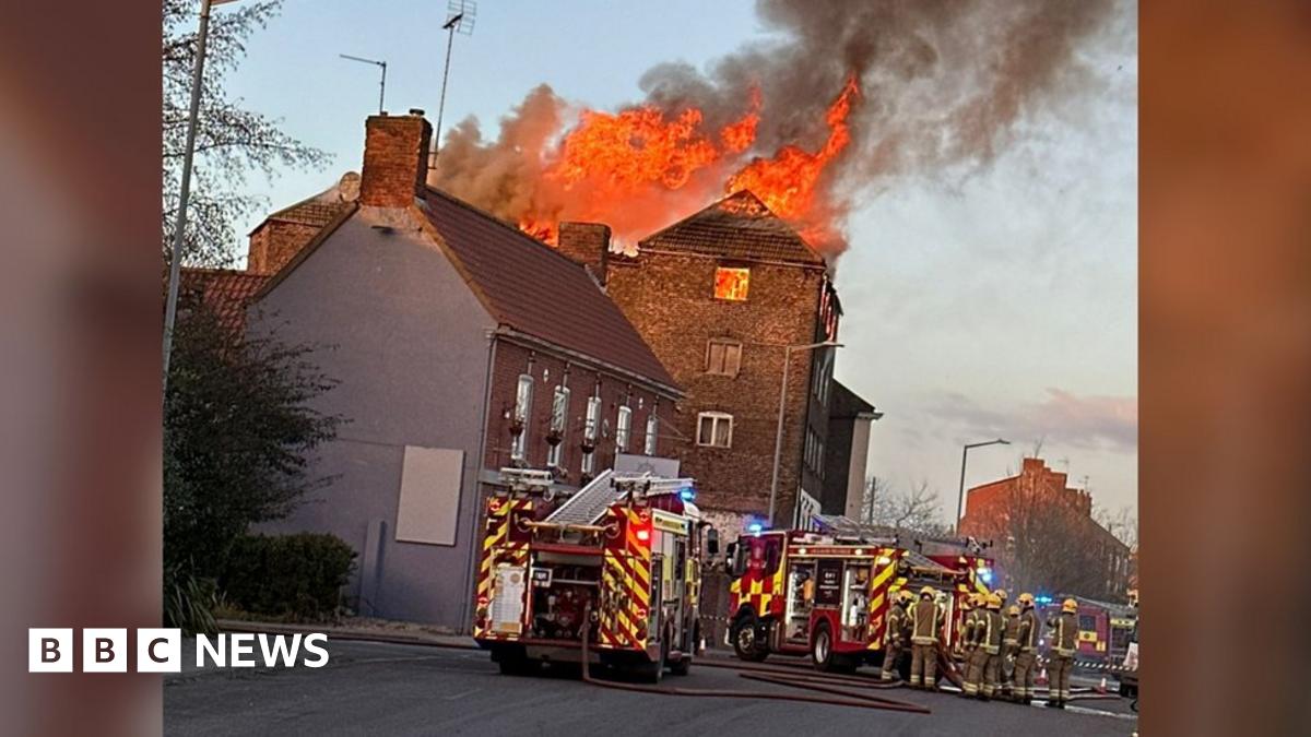 Crews damping down after Boston derelict building fire - BBC News
