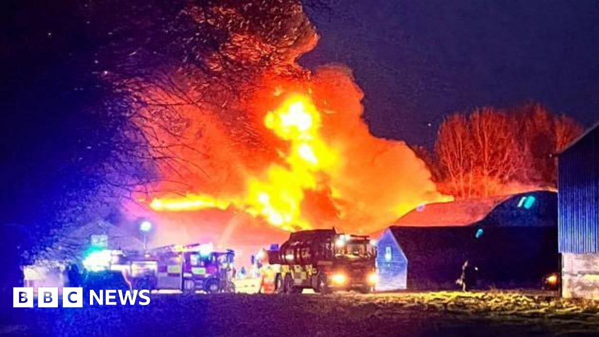 Crews work to contain fire in Burnham-on-Crouch farm buildings - BBC News