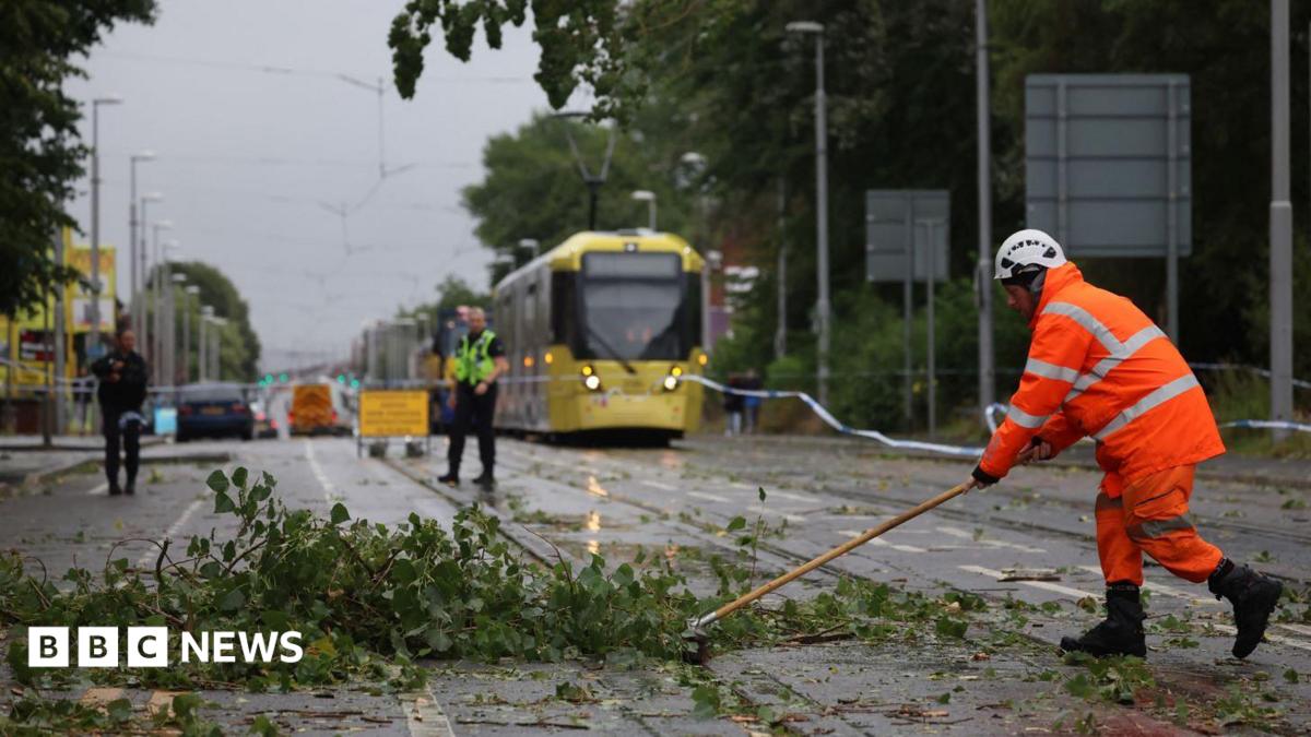 Storm sees traffic disruption and damage across city - BBC News