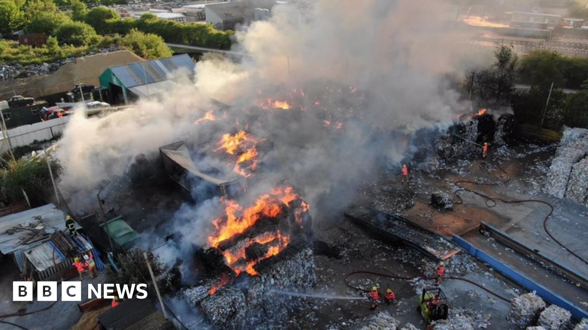 Fire engulfs 200 tonnes of waste paper in Wigan - BBC News