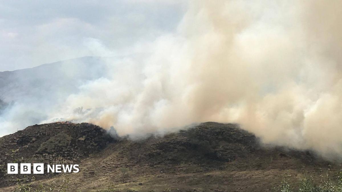 Railway line at Glenfinnan reopens after wildfire - BBC News