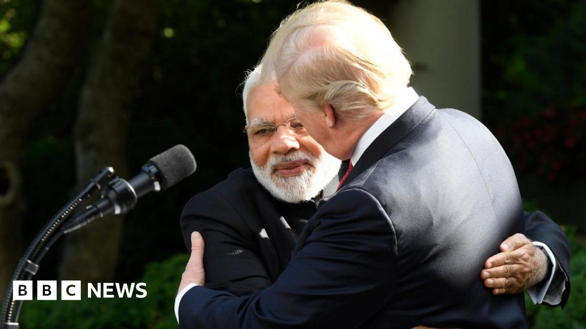 Modi's enthusiastic bear hug beats Trump's handshake - BBC News