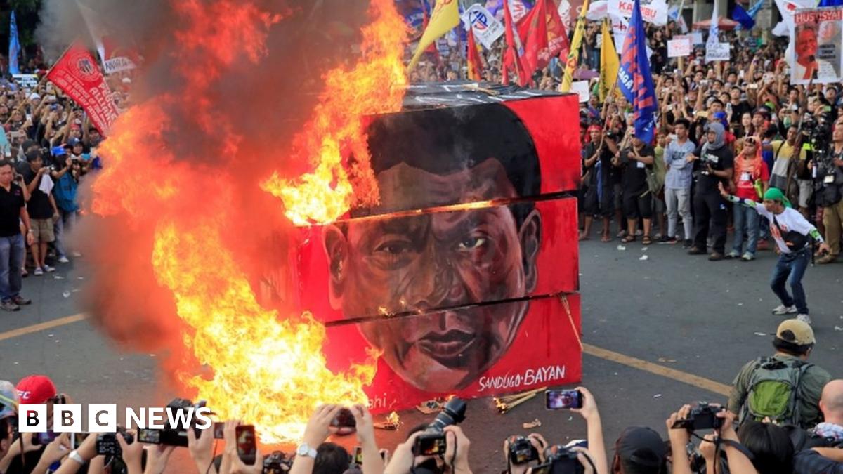 Mass protest in Philippines over Duterte 'dictatorship' - BBC News