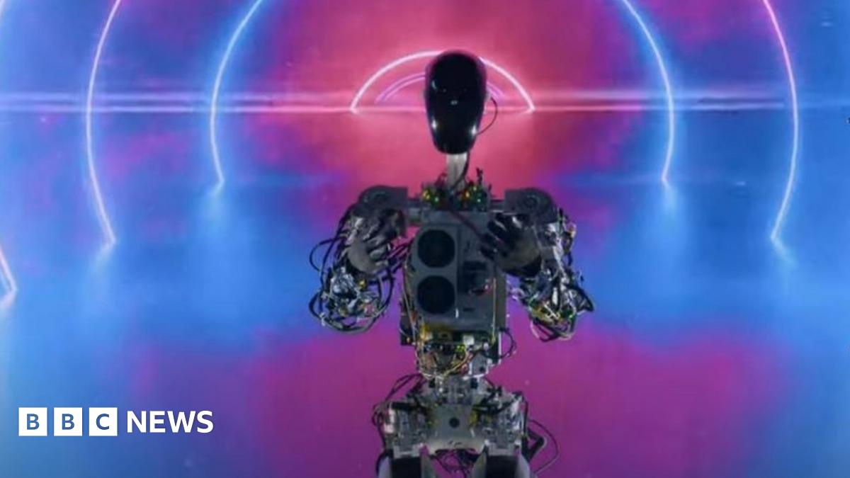 Tesla boss Elon Musk presents humanoid robot Optimus - BBC News